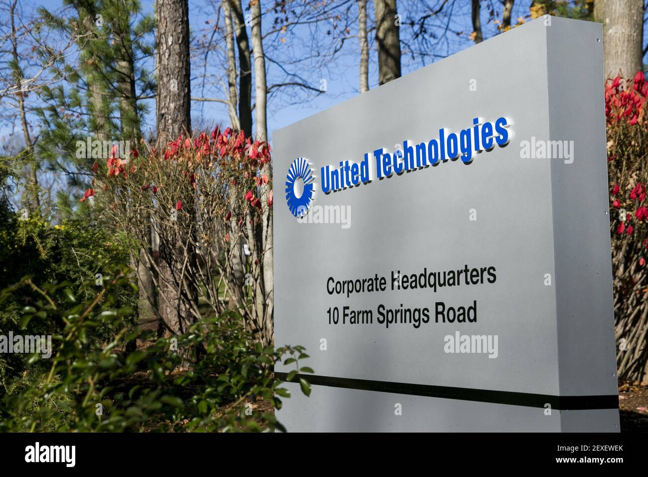 A logo sign outside of the headquarters of the United Technologies ...