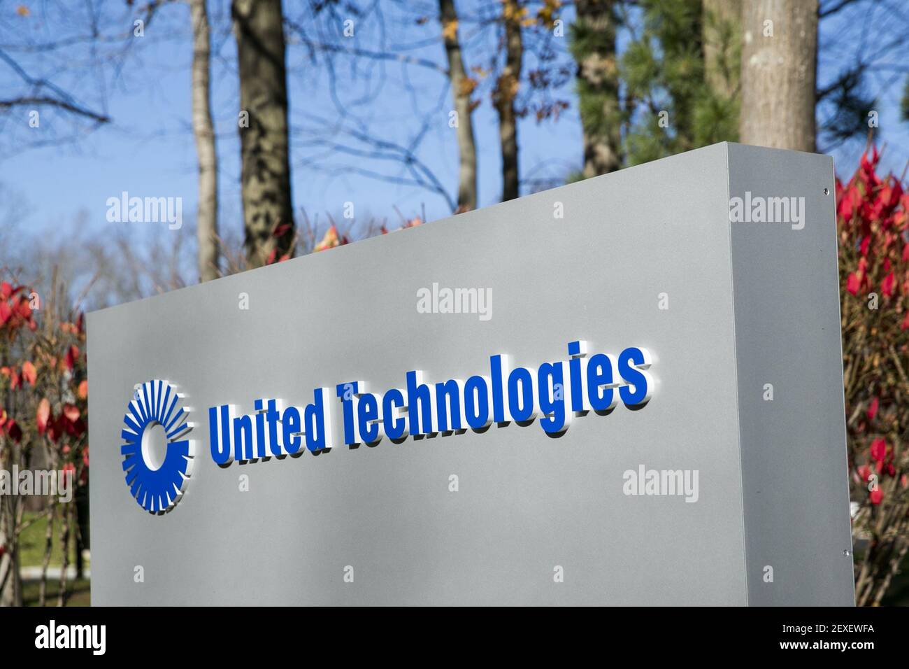 A logo sign outside of the headquarters of the United Technologies ...