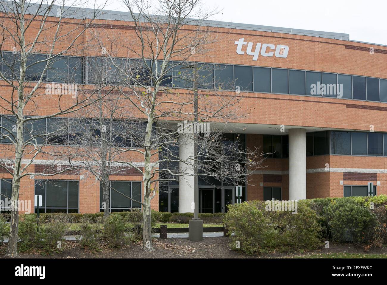 A logo sign outside of the headquarters of Tyco International Ltd., in ...