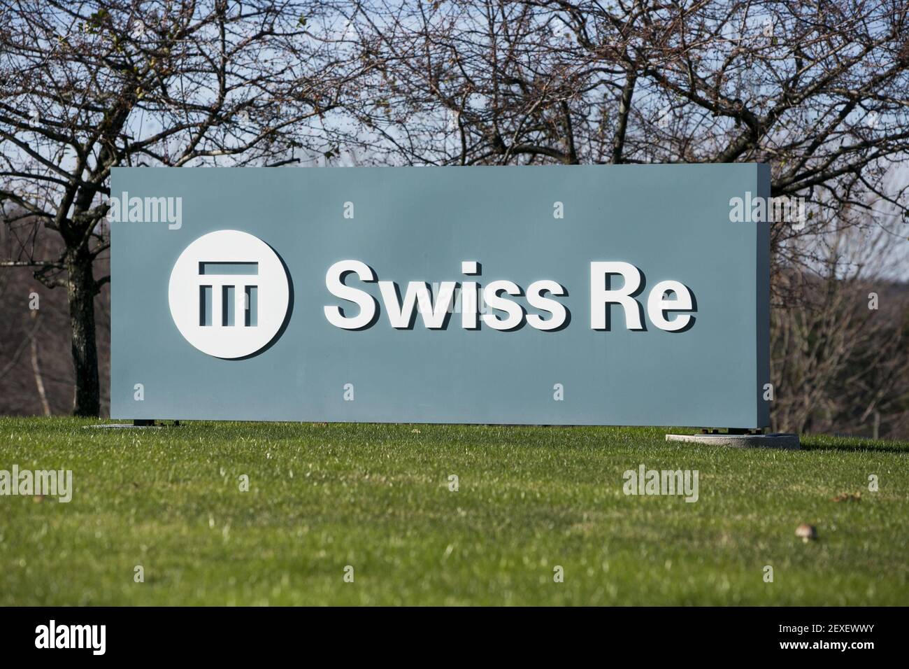 A logo sign outside of a facility occupied by Swiss Reinsurance Company ...