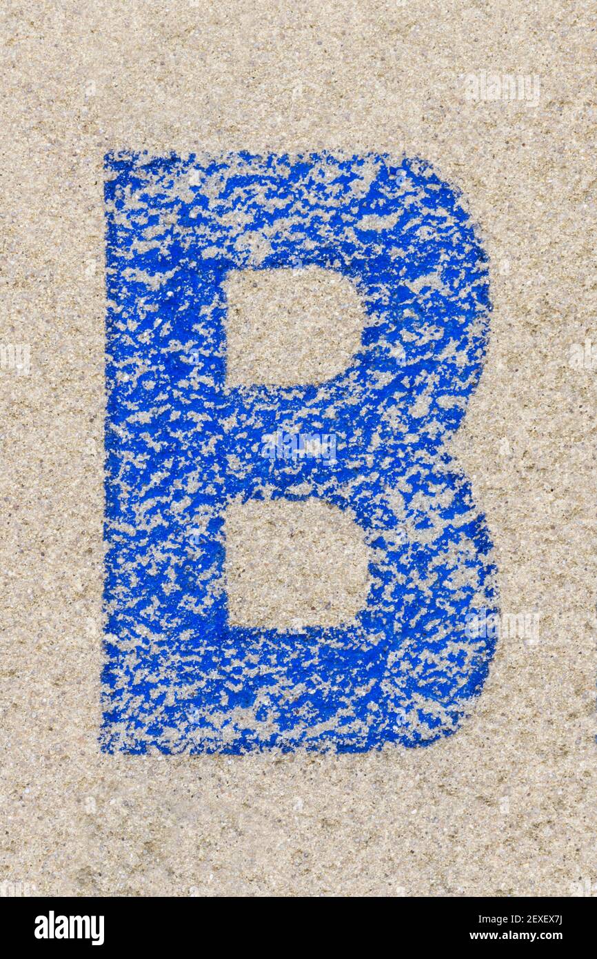 Blue letter B painted on plastered wall in blue colour Stock Photo - Alamy
