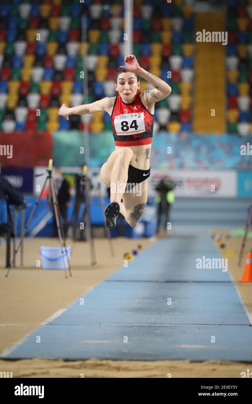 ISTANBUL, TURKEY - FEBRUARY 20, 2021: Undefined athlete triple jumping ...