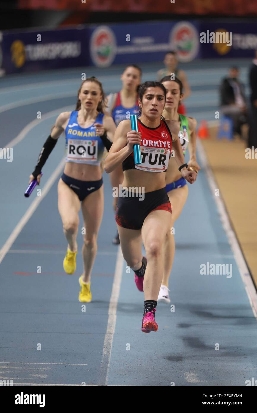 ISTANBUL, TURKEY - FEBRUARY 20, 2021: Athletes running 4x400 metres ...