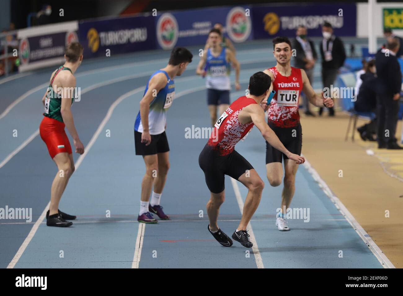 ISTANBUL, TURKEY - FEBRUARY 20, 2021: Athletes running 4x400 metres ...
