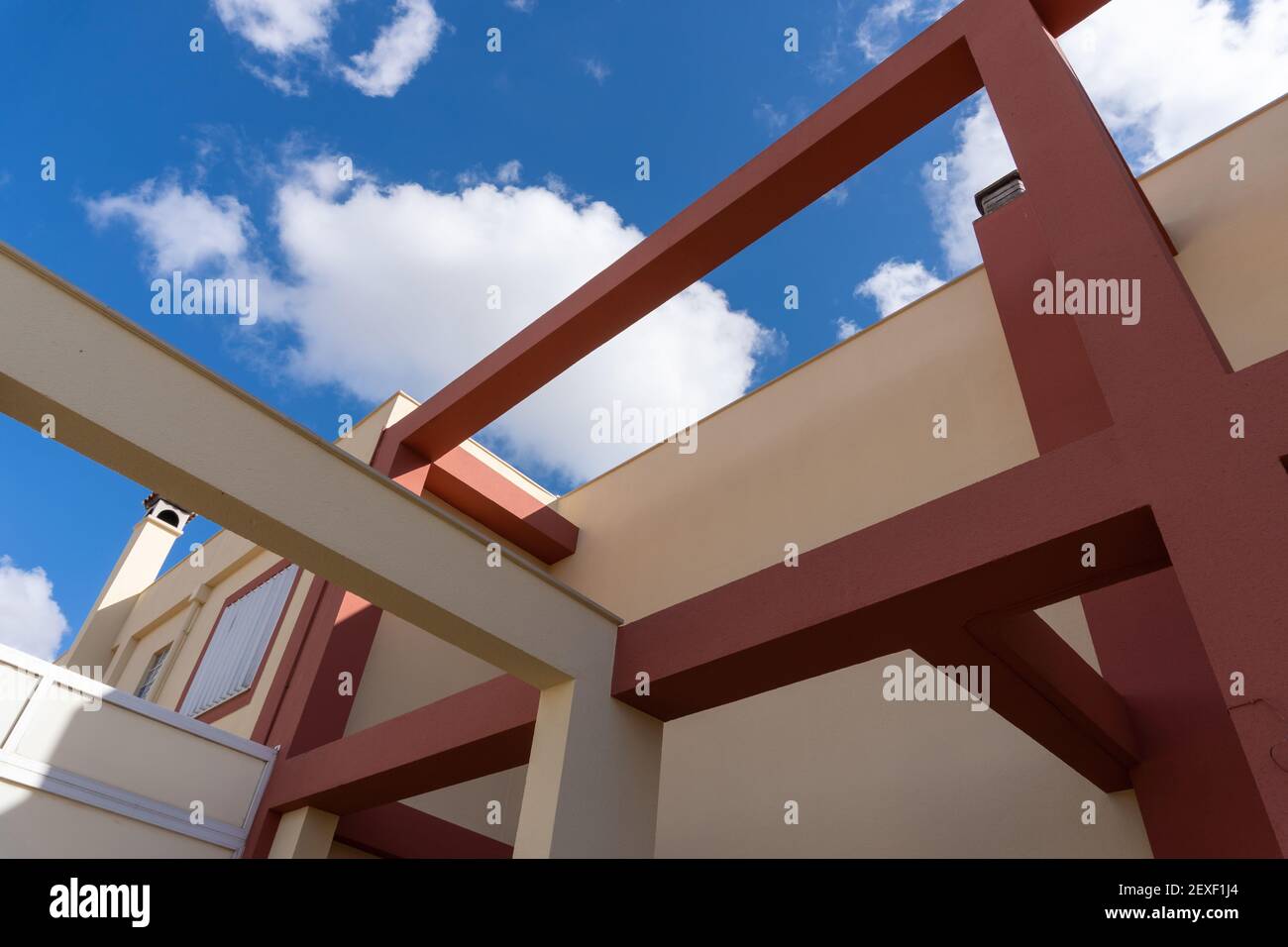 Stock photo of red and yellow building with modern architecture Stock ...