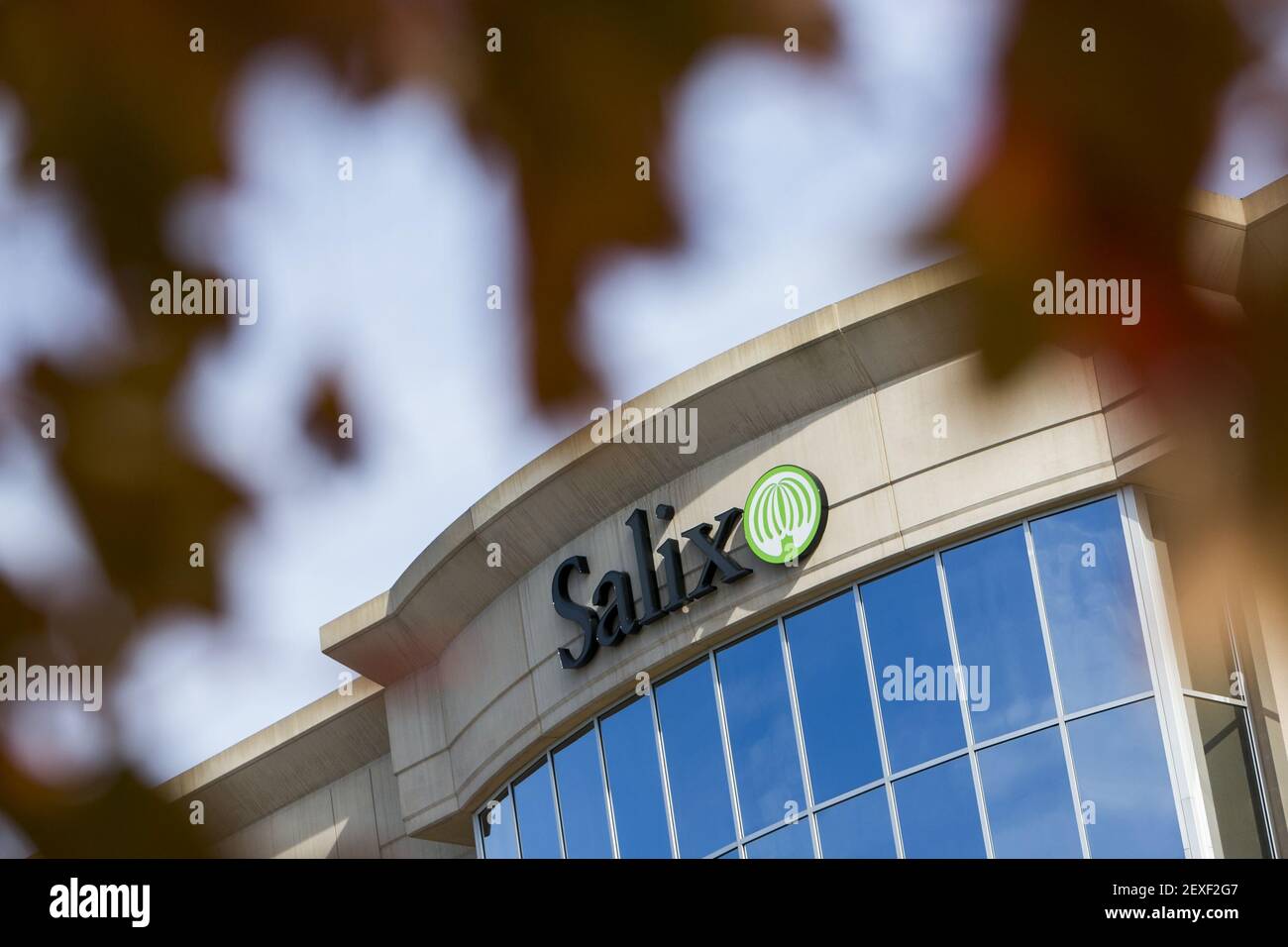 A logo sign outside of the headquarters of Salix Pharmaceuticals, Inc ...
