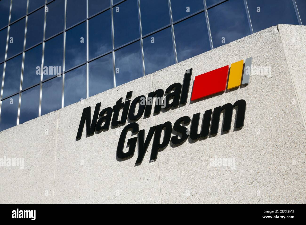 A logo sign outside of the headquarters of the National Gypsum Company ...