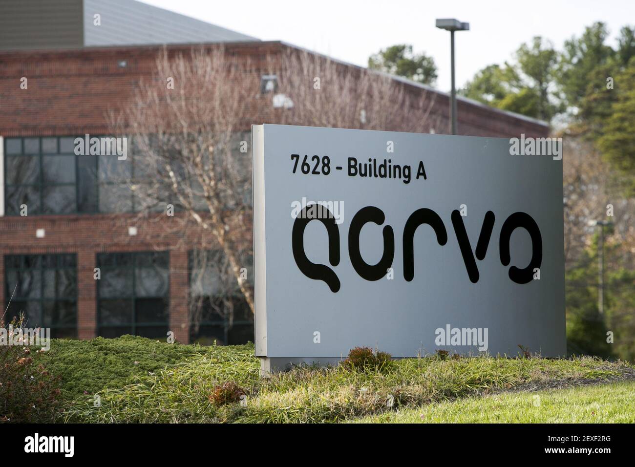 A logo sign outside of the headquarters of Qorvo in Greensboro, North ...