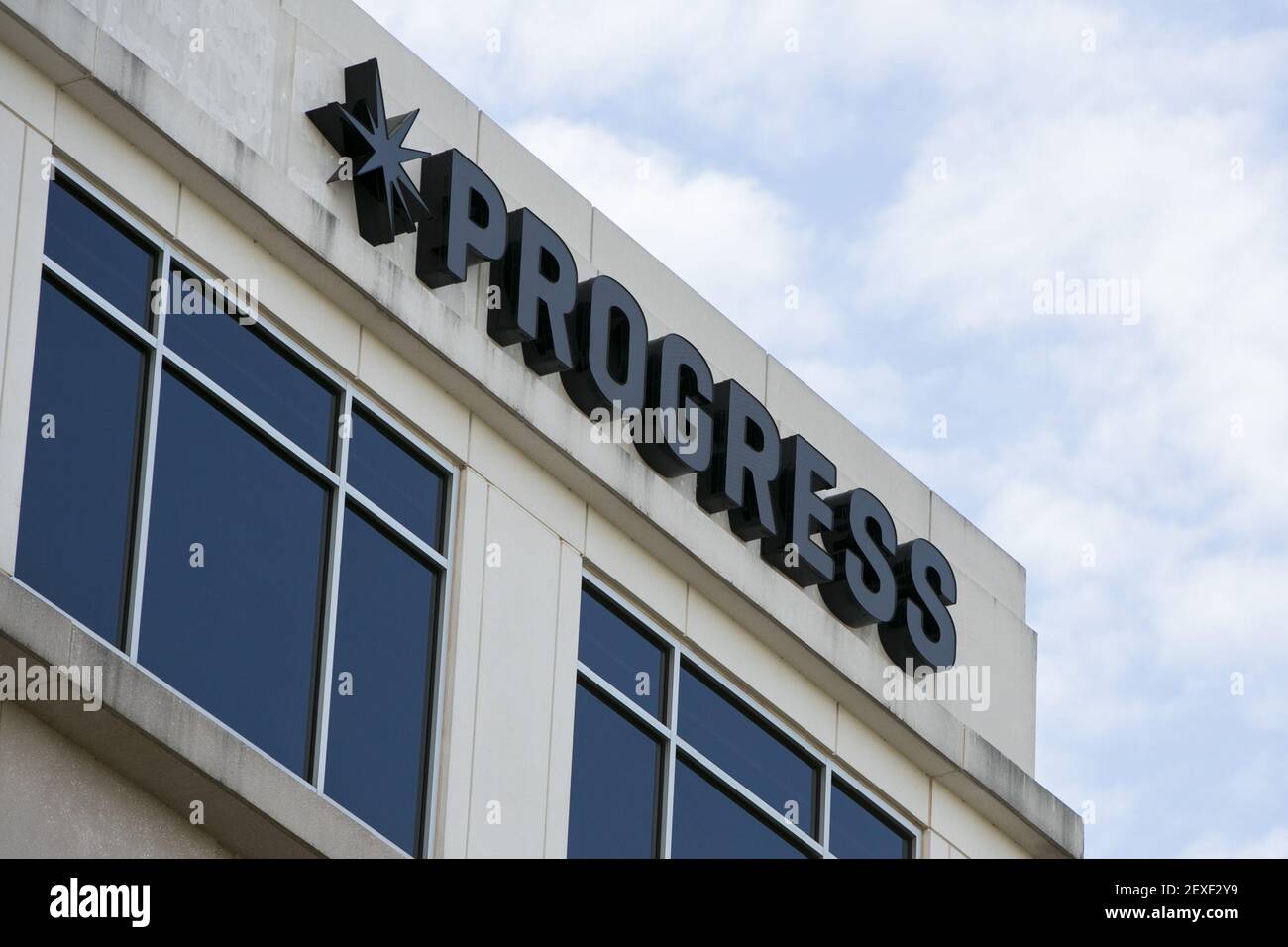 A logo sign outside of a facility occupied by Progress Software in ...