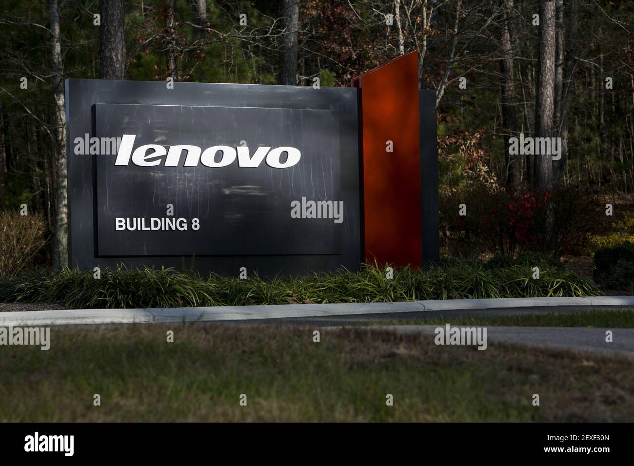 A logo sign outside of a facility occupied by the Lenovo Group in ...