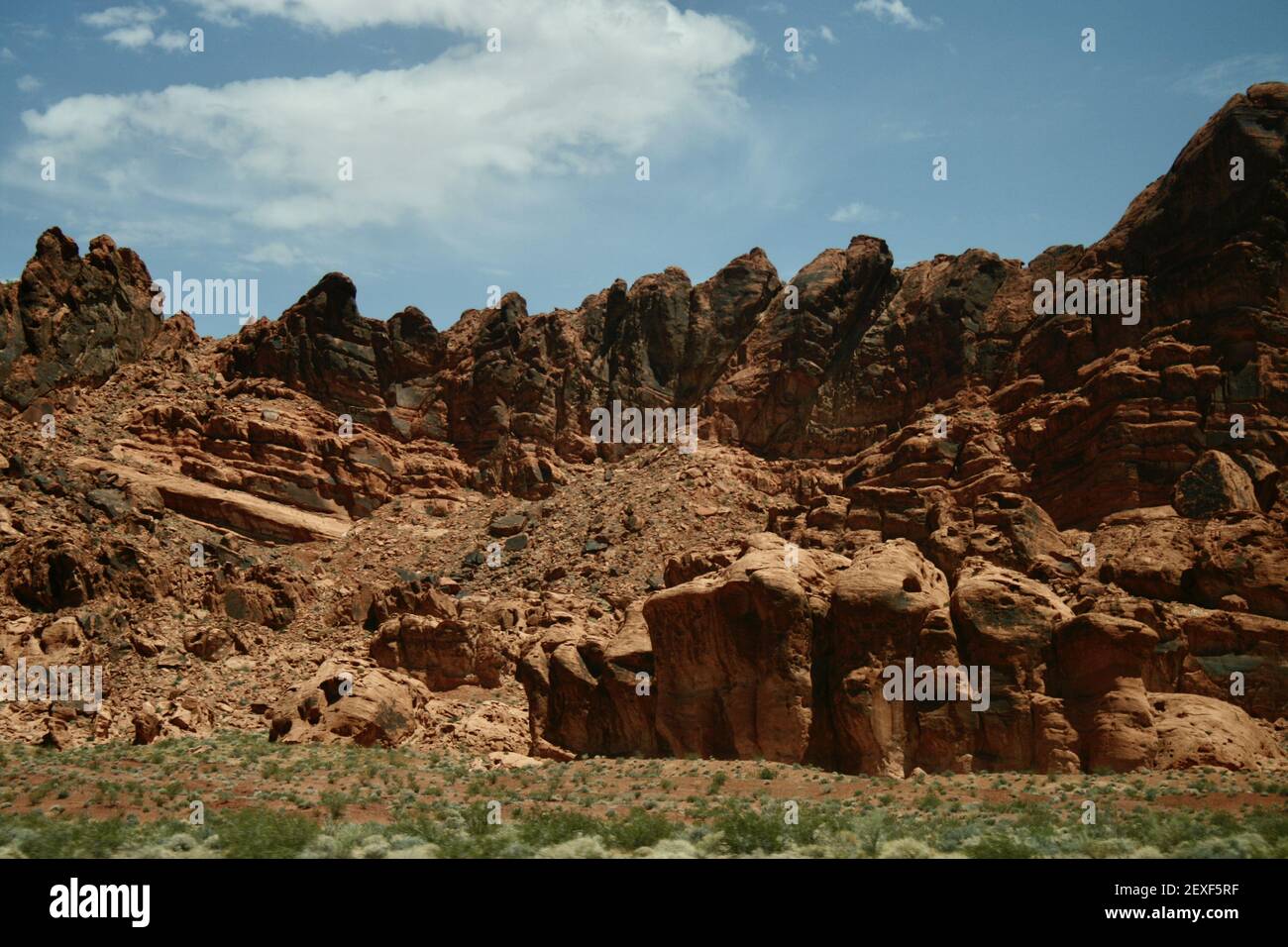 A beautiful of red mountains under a blue sky Stock Photo - Alamy
