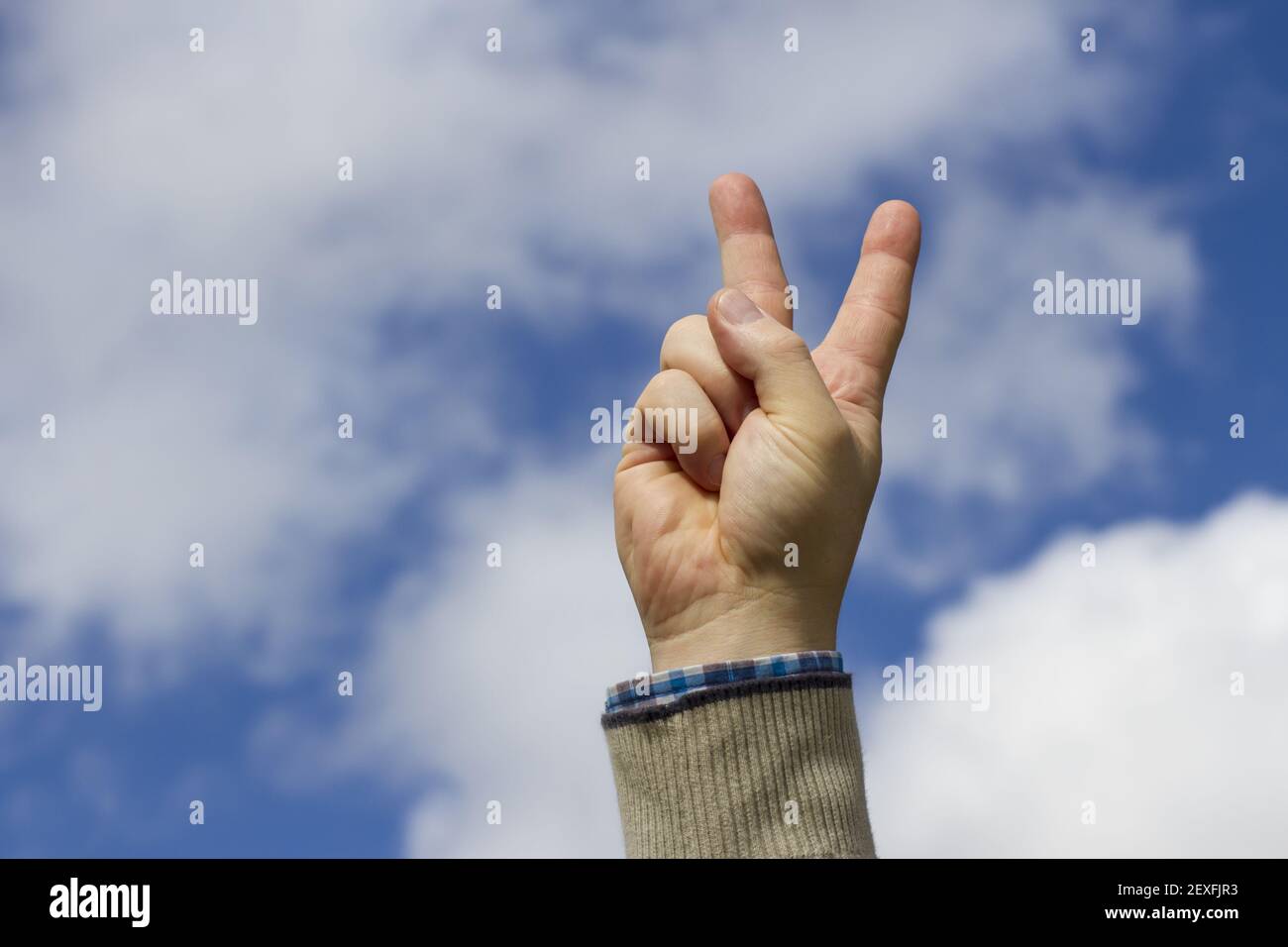 Hand up in victory Stock Photo - Alamy