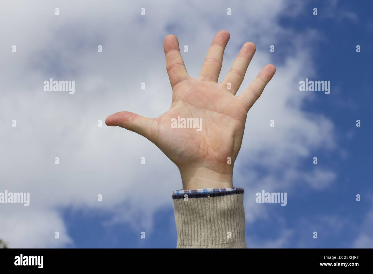 Praying with palm open hi-res stock photography and images - Alamy