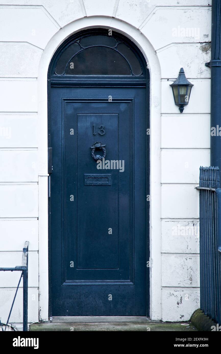 Typical blue entry door hi-res stock photography and images - Alamy