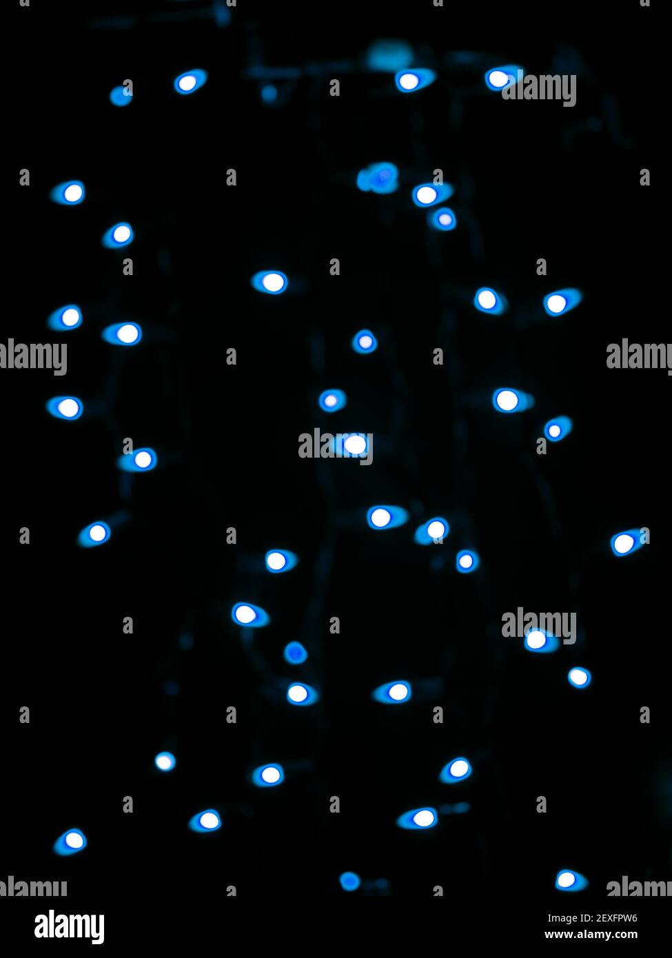 Blur view of blue halloween neon lights Stock Photo - Alamy