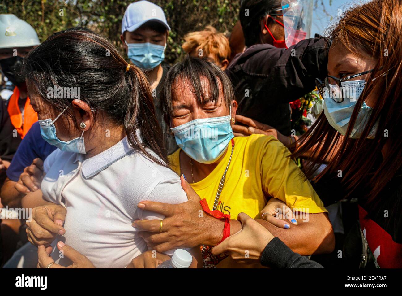 A relative of Ma Kyal Sin mourns during her funeral ceremony.Millions ...