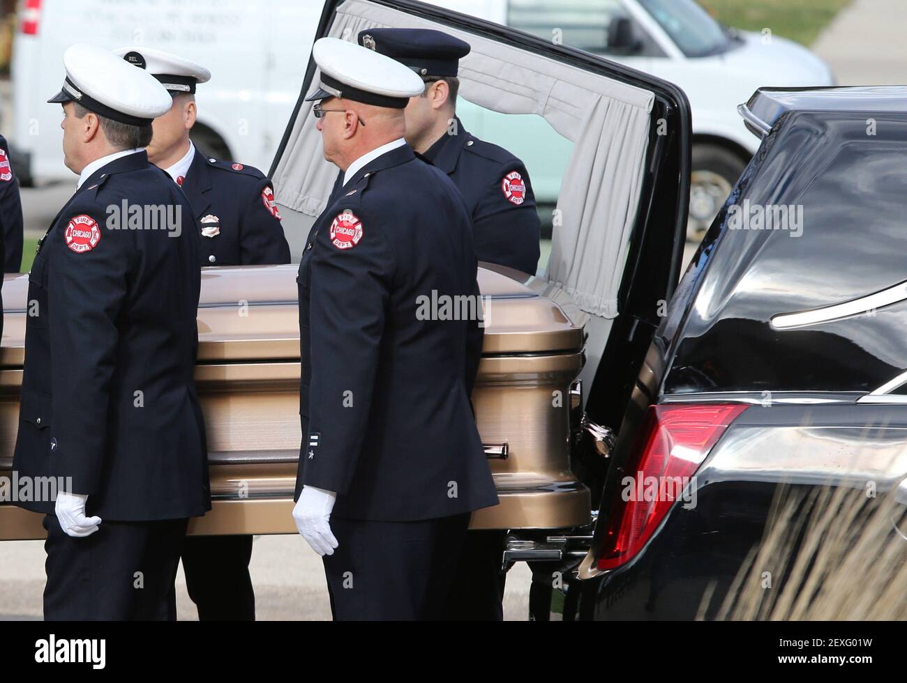 Chicago firefighters carry in the casket of fellow firefighter Daniel ...