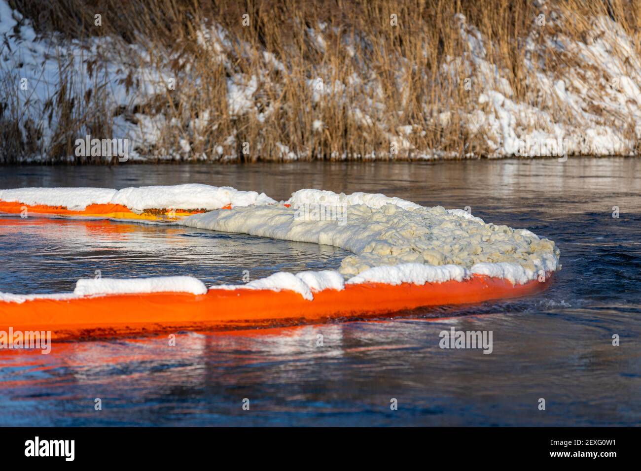 The floating boom prevents foam and debris from contaminating the ...