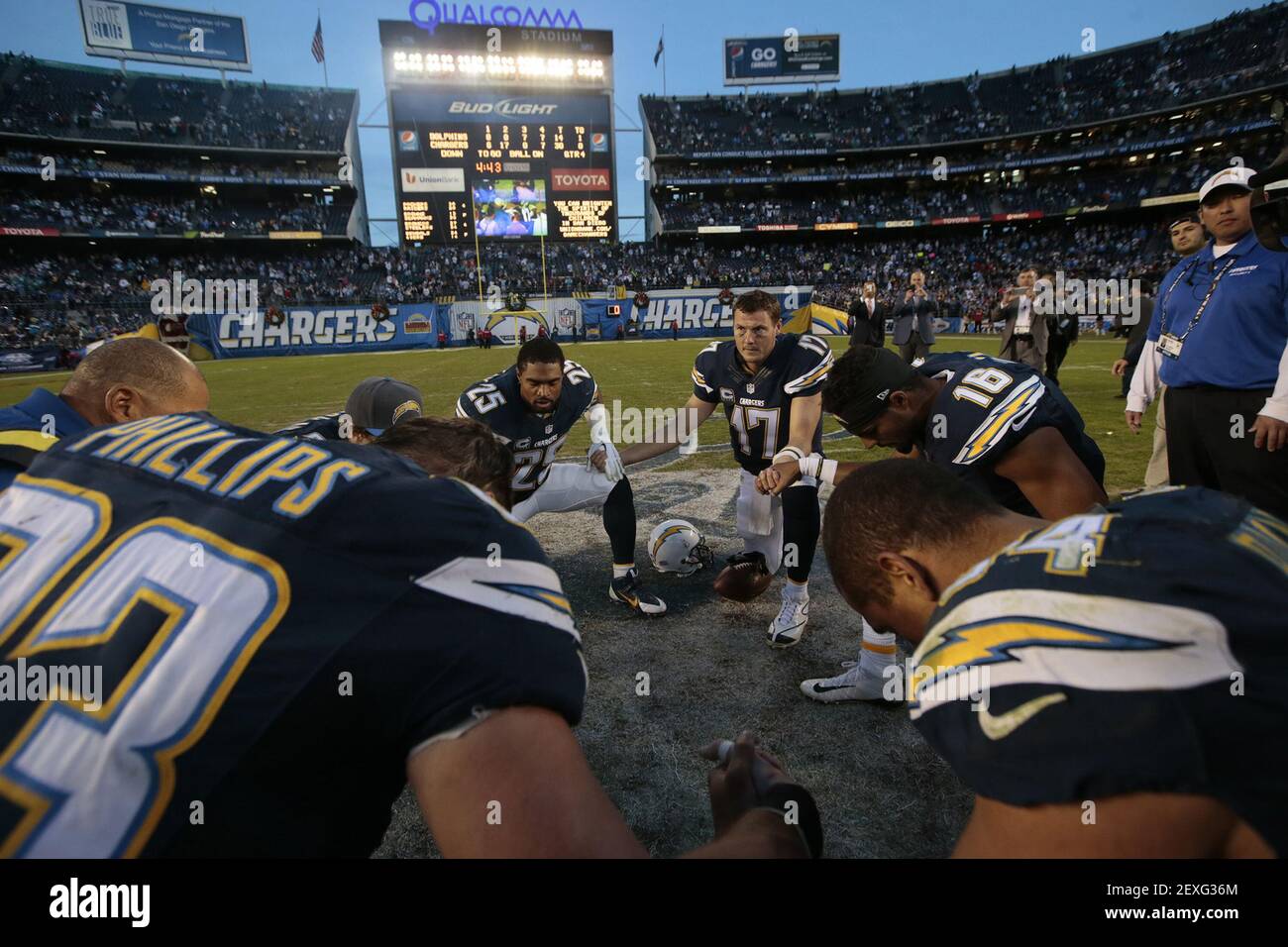 San Diego Chargers quarterback Philip Rivers leads a prayer group with ...