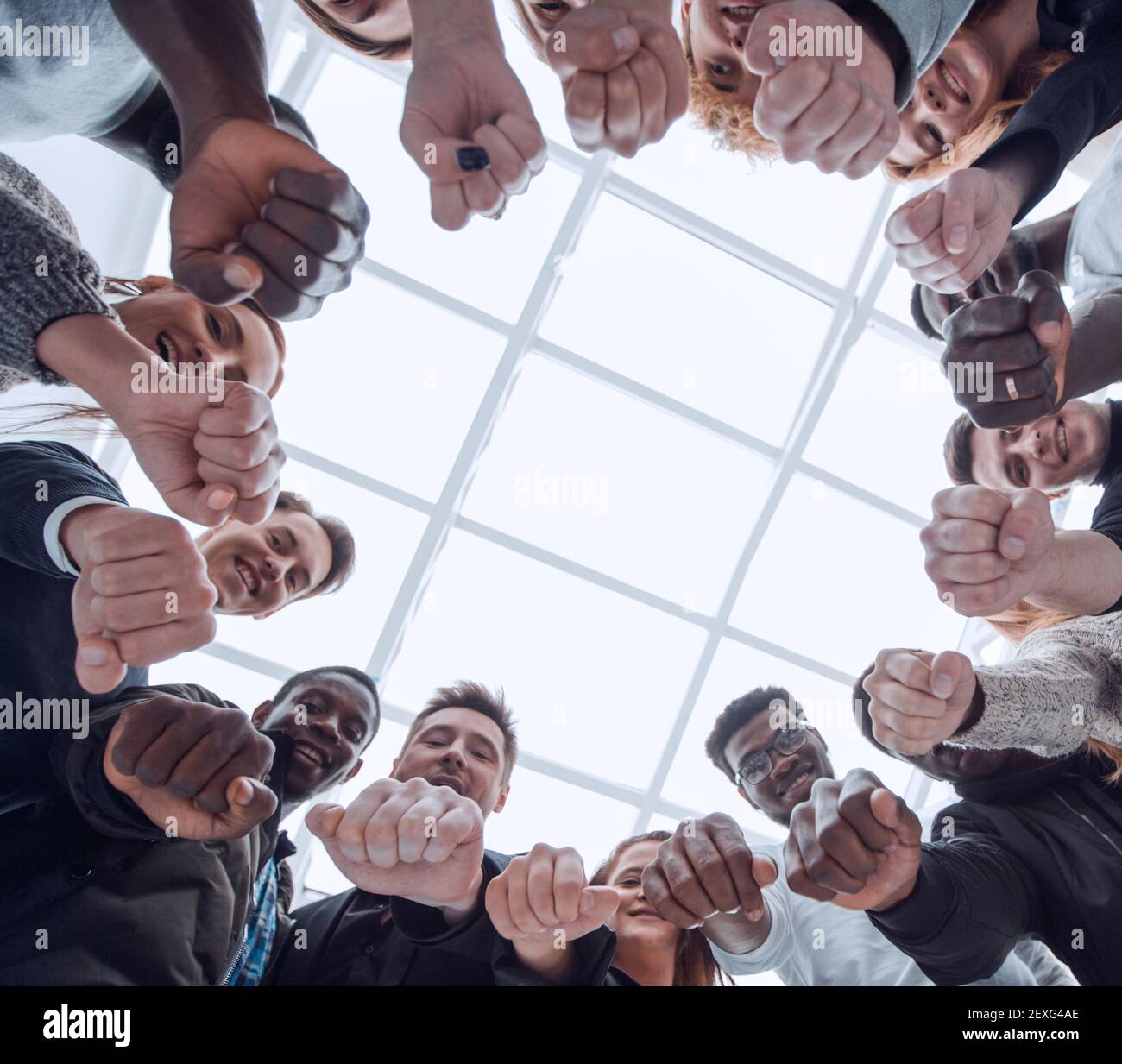 group of diverse ambitious young people standing in a circle Stock ...
