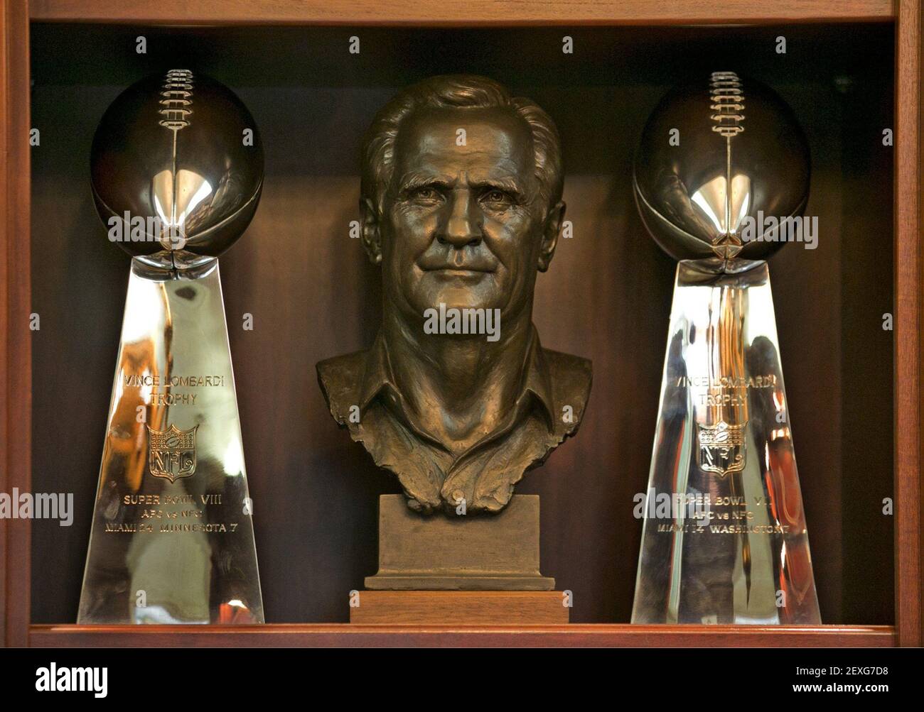 Replica Vince Lombardi trophies for Super Bowl VII and VIII and a ...