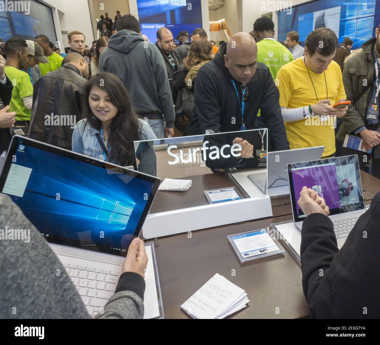 Shoppers try out Surface laptops at the Microsoft flagship store on ...