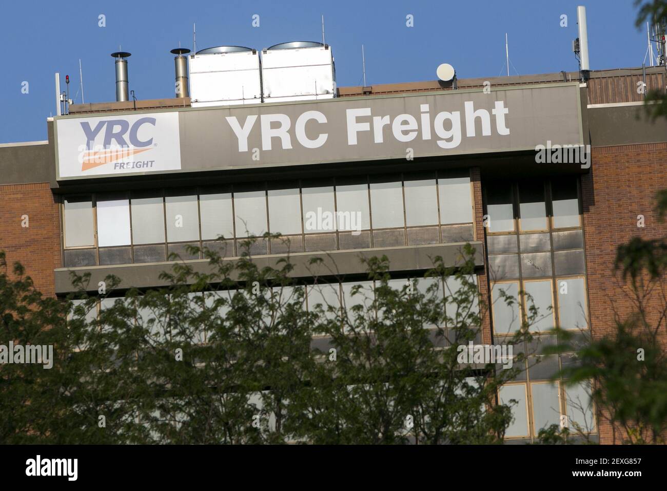 A logo sign outside of the headquarters of YRC Worldwide, Inc., in ...