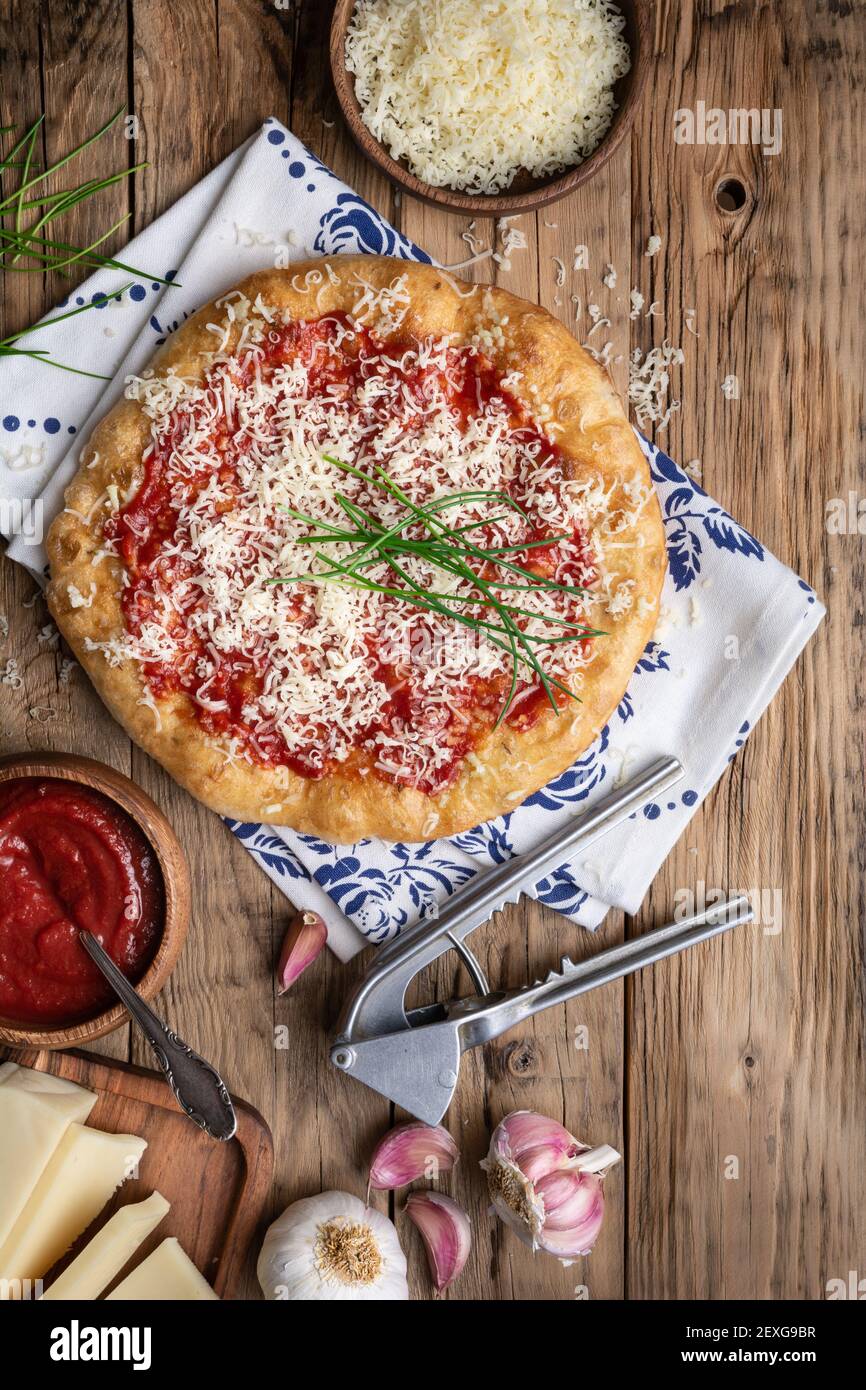 Classic Hungarian street food Langos, fried bread topped with ketchup ...
