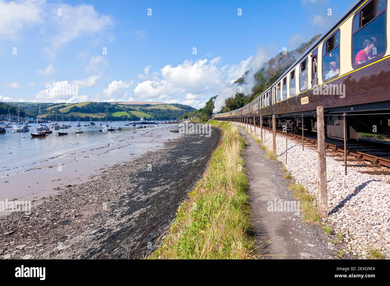 England, Devon, GWR Steam Locomotive No. 7827 'Lydham Manor' departing ...