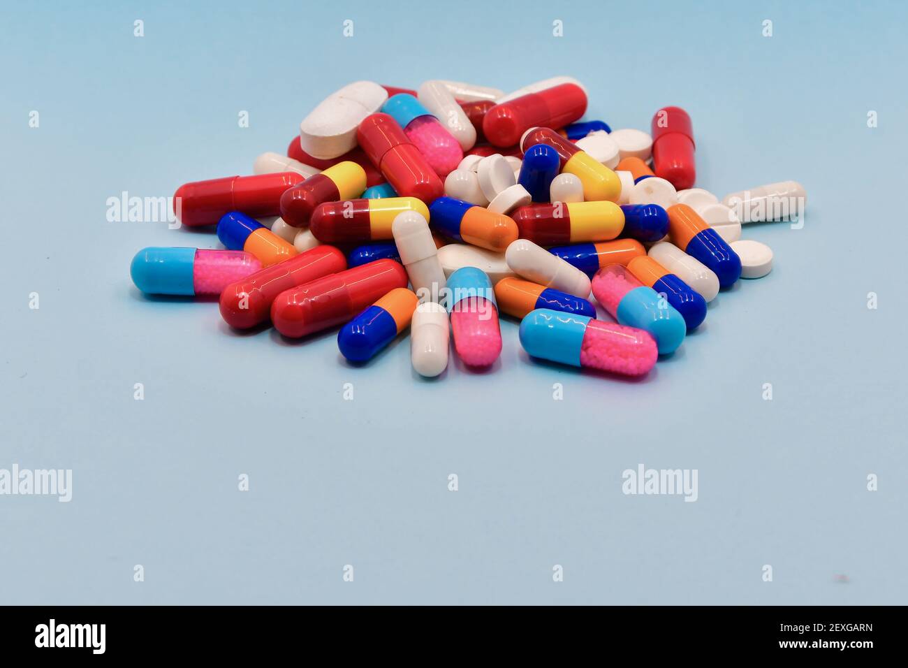 original photography of drugs on light blue background Stock Photo - Alamy