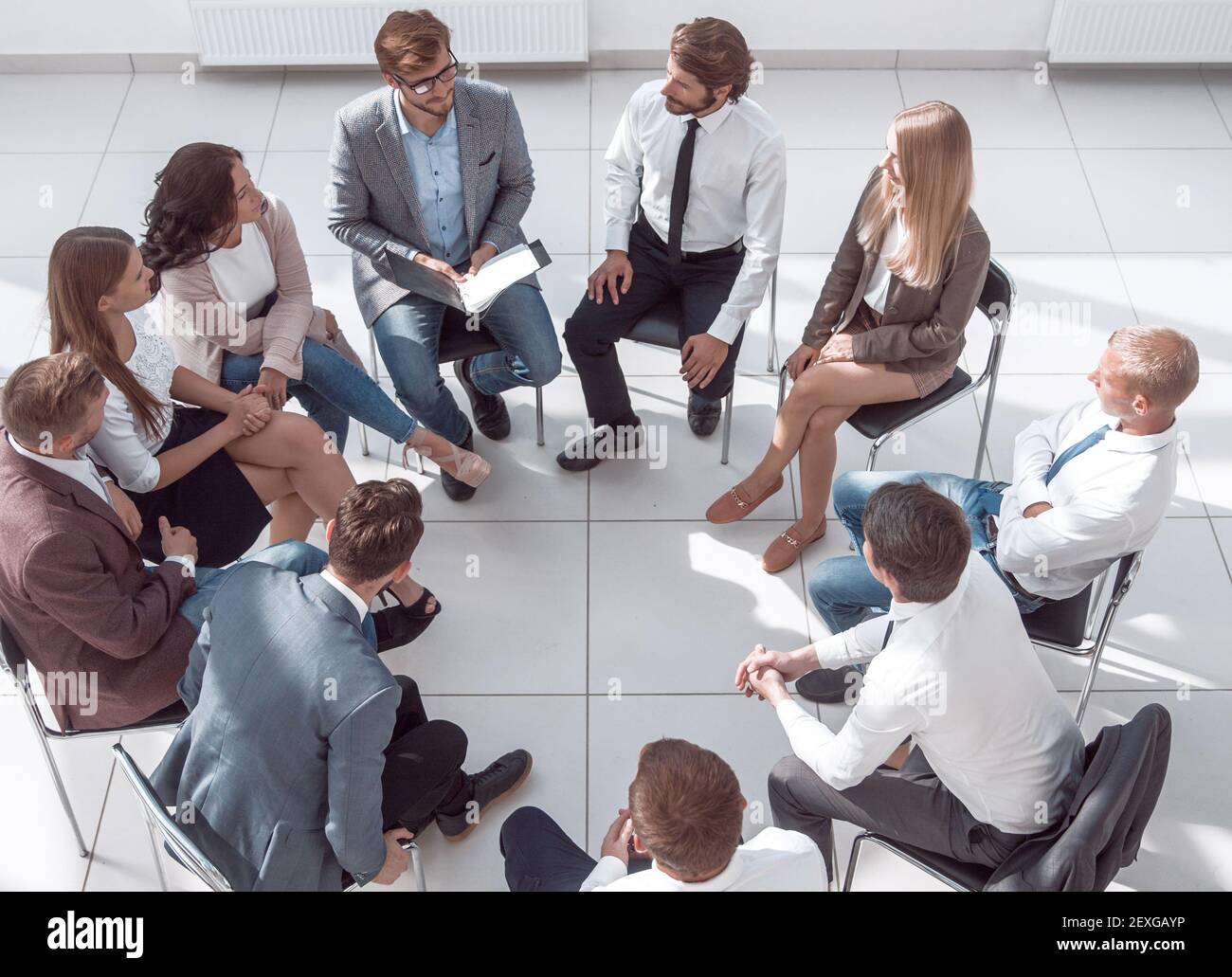 young employees ask questions during business training Stock Photo - Alamy