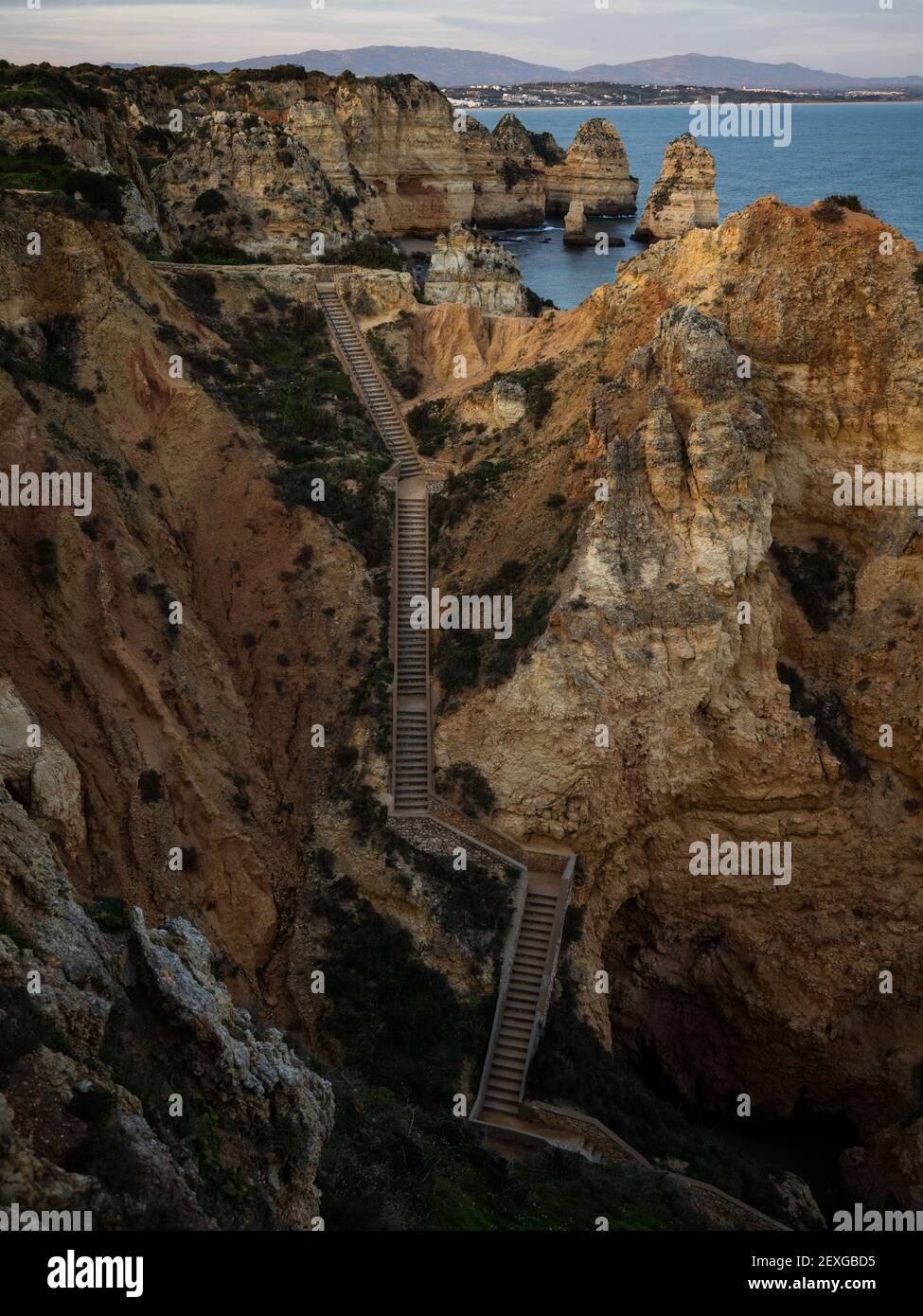 Wooden walkway stairs path staircase sunset panorama view of Ponta da ...