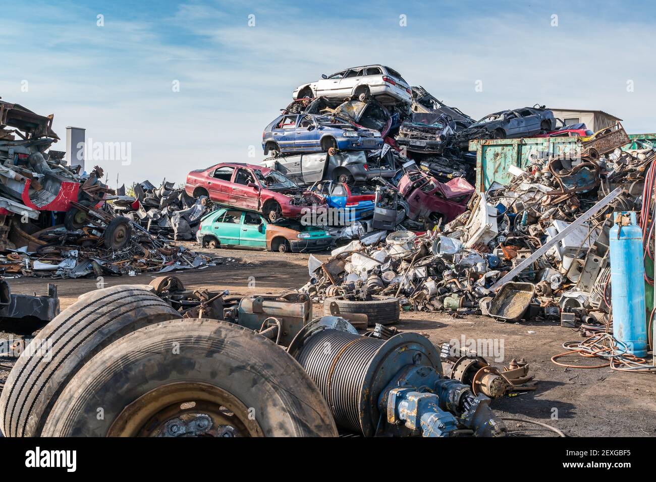 Old cars in landfill. Garbage pile in trash dump or landfill. Pollution ...