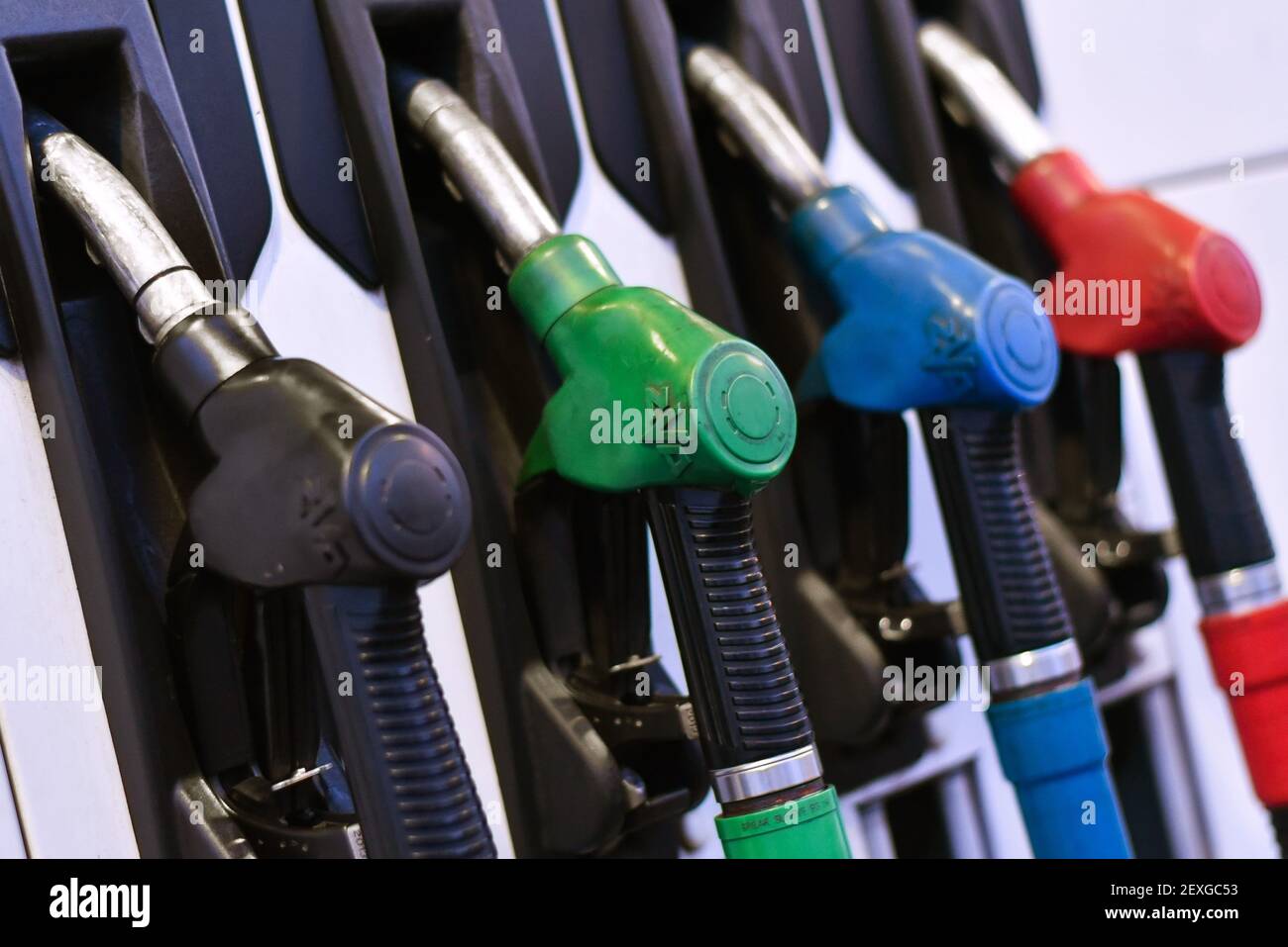 Fuel pump nozzle seen at a gas station Stock Photo - Alamy