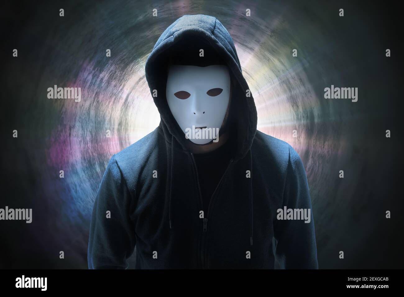 Masked anonymous hacker in tunnel. Internet security concept Stock ...