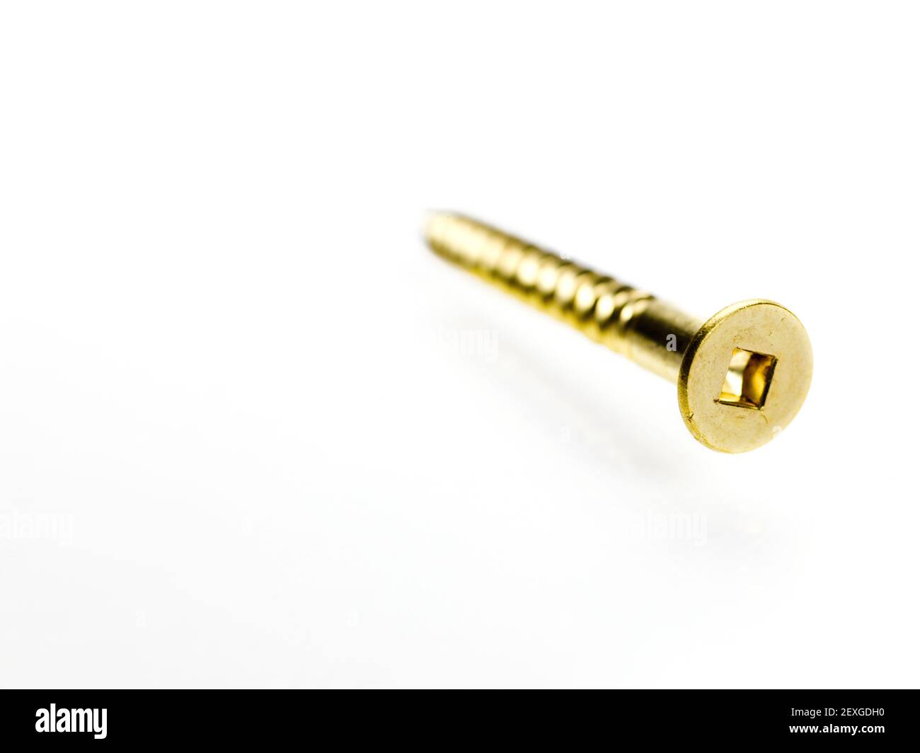Gold Screw Up Close Stock Photo - Alamy