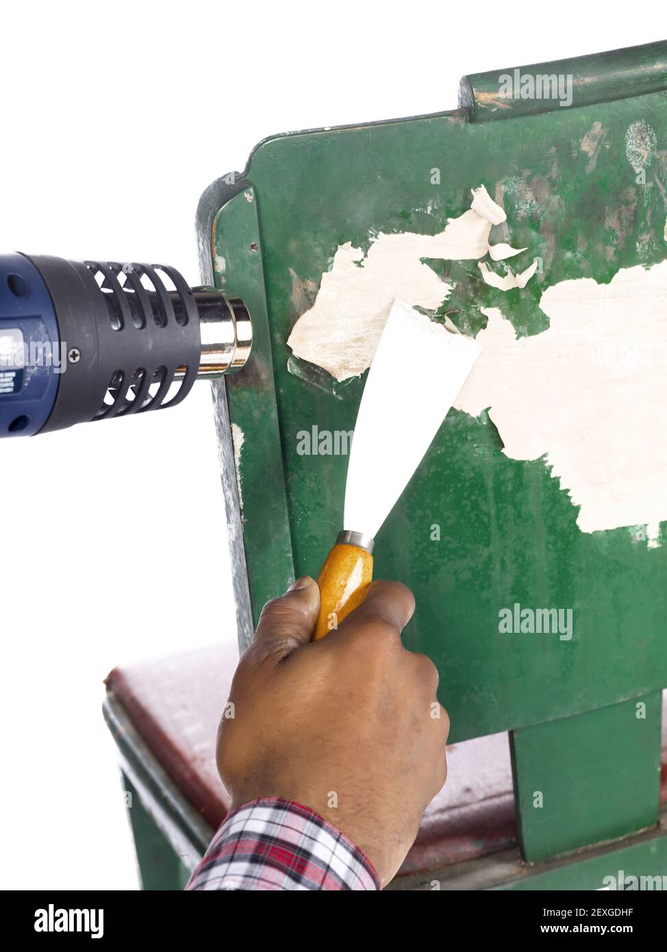 Human hand holding chisel and heat gun Stock Photo - Alamy