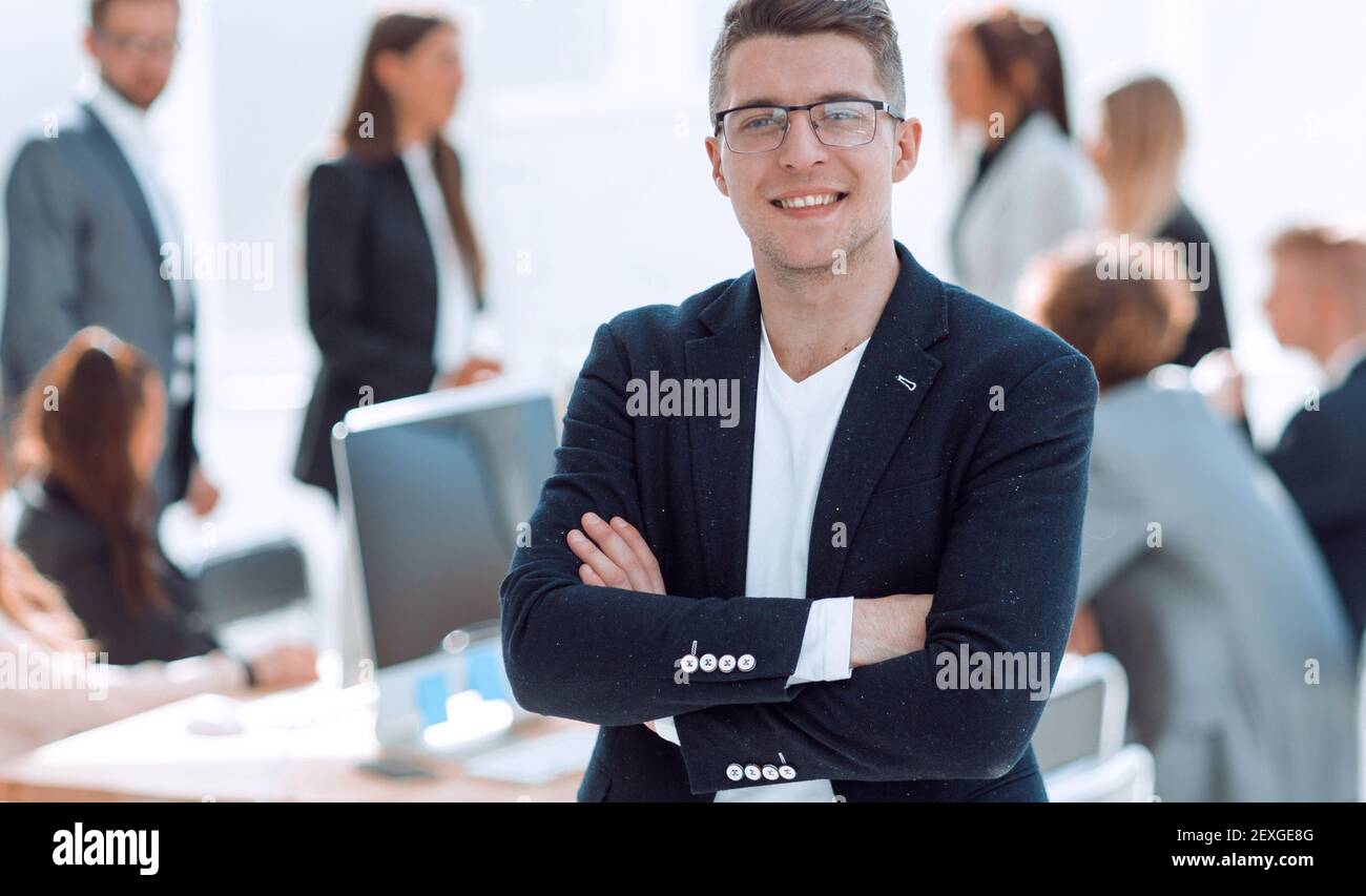 successful business man standing in the office Stock Photo - Alamy