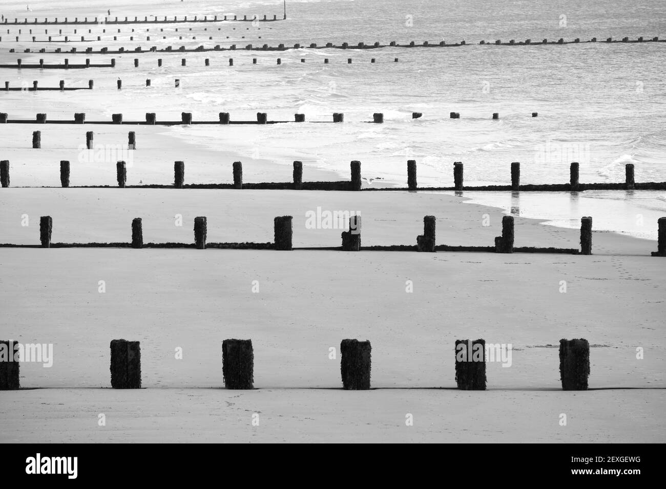 Groynes beach view Black and White Stock Photos & Images - Alamy