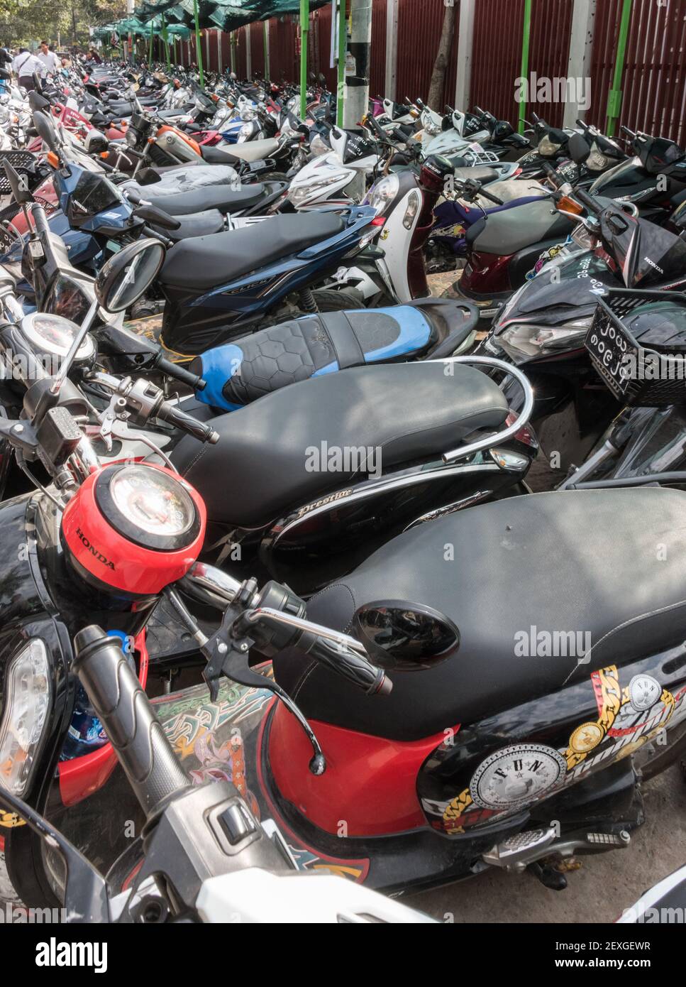 Motorcycles parked in Mandalay, Myanmar Stock Photo - Alamy