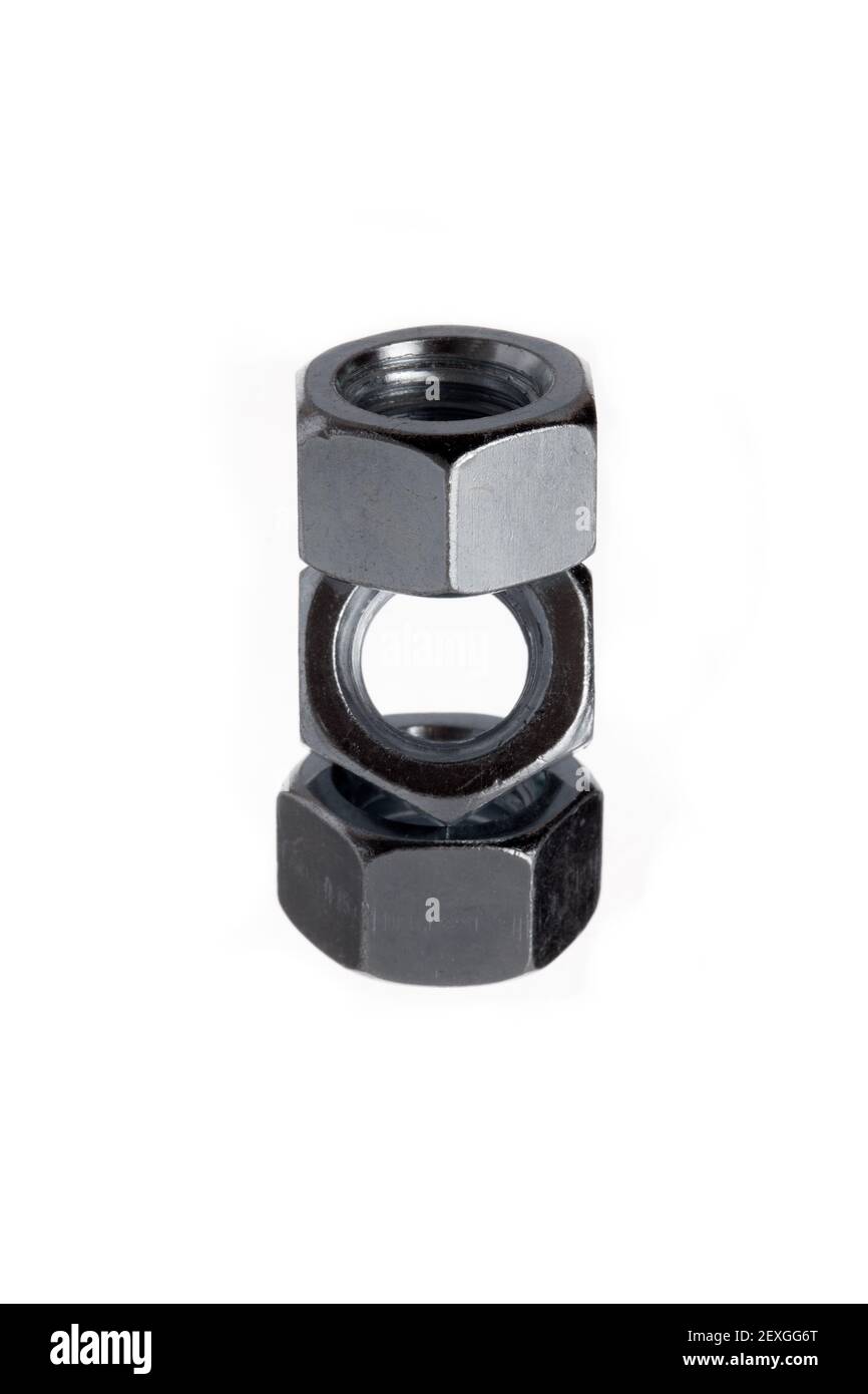 Three nuts in a pile Stock Photo - Alamy