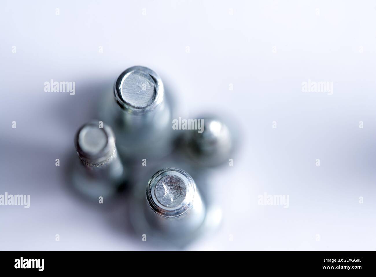 Tops of Bolts Stock Photo - Alamy