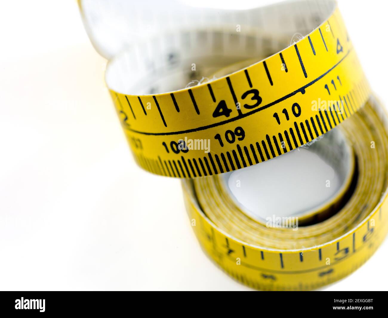Rolled Up Measuring Tape Stock Photo - Alamy