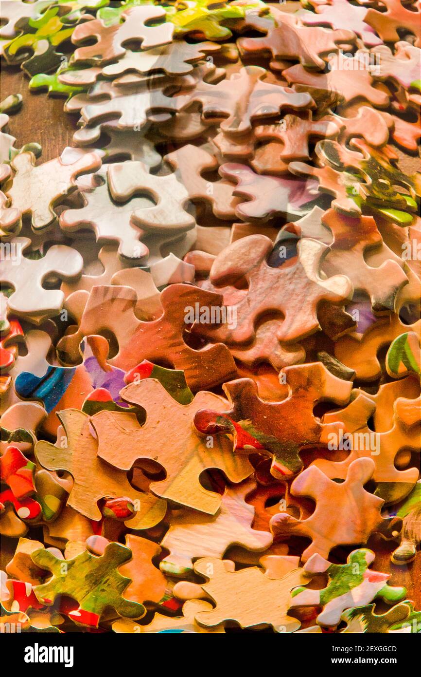 Random jigsaw pieces in a mess before being chosen to make up an image ...