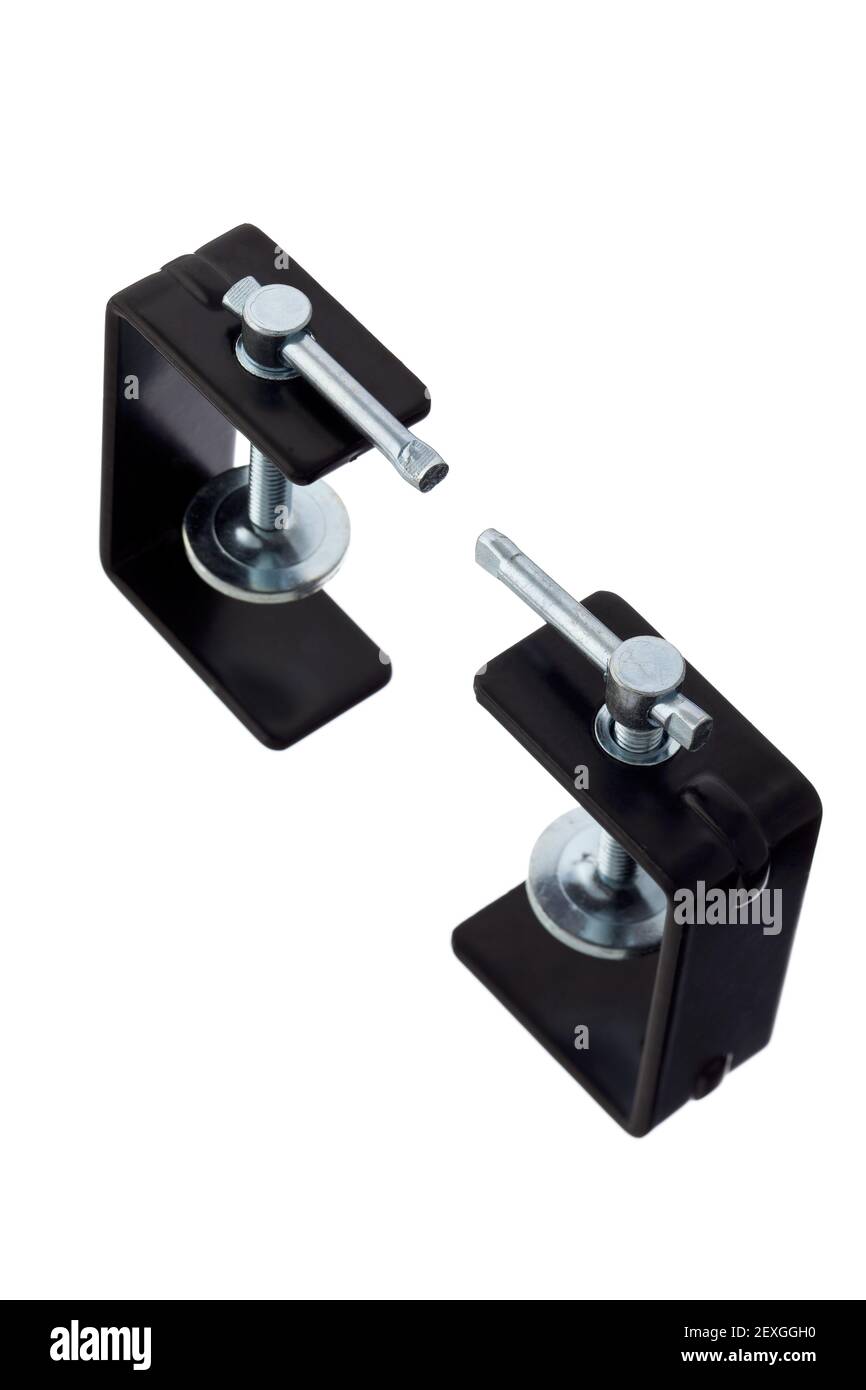 Two black metal clamp Stock Photo - Alamy