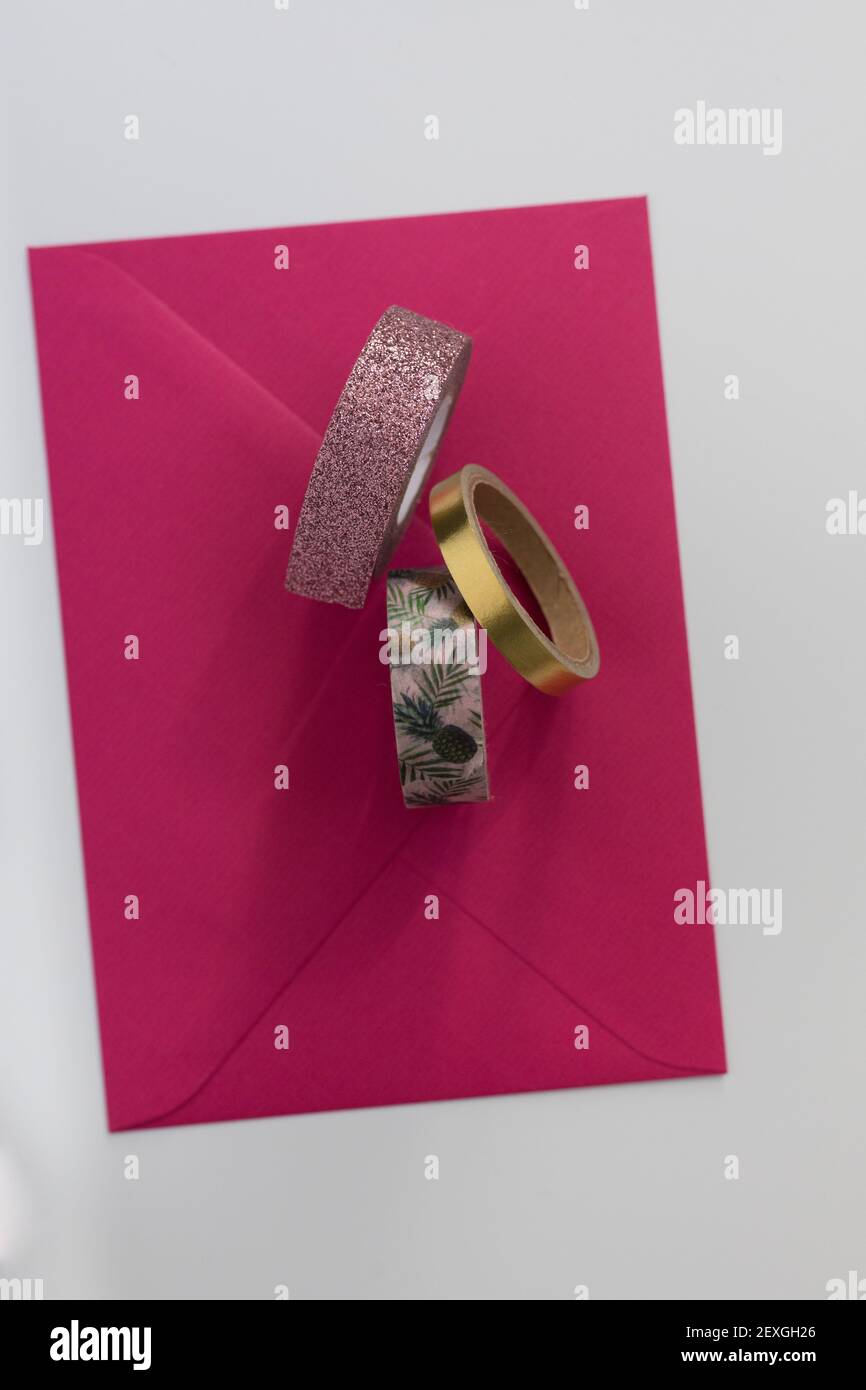 Closeup view of three elegant fun adhesive tapes in vertical position ...