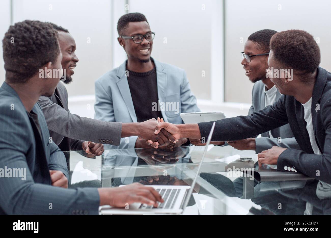 business colleagues greeting each other with a handshake Stock Photo ...