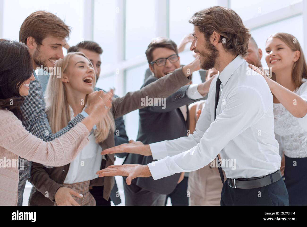 business team congratulating each other on the victory Stock Photo - Alamy