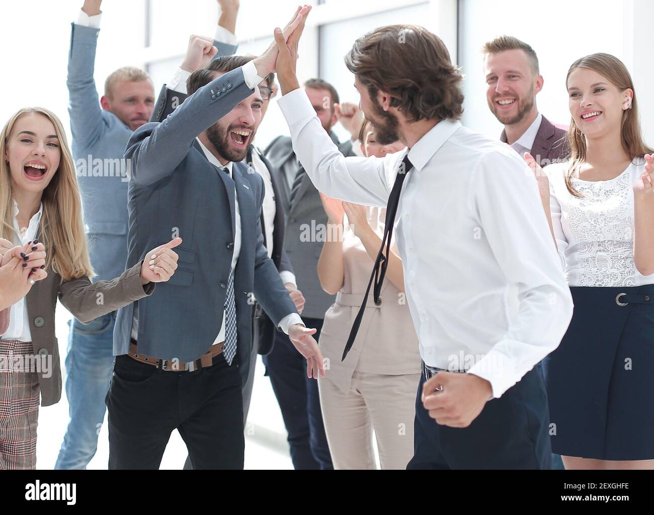 business team congratulating each other on the victory Stock Photo - Alamy