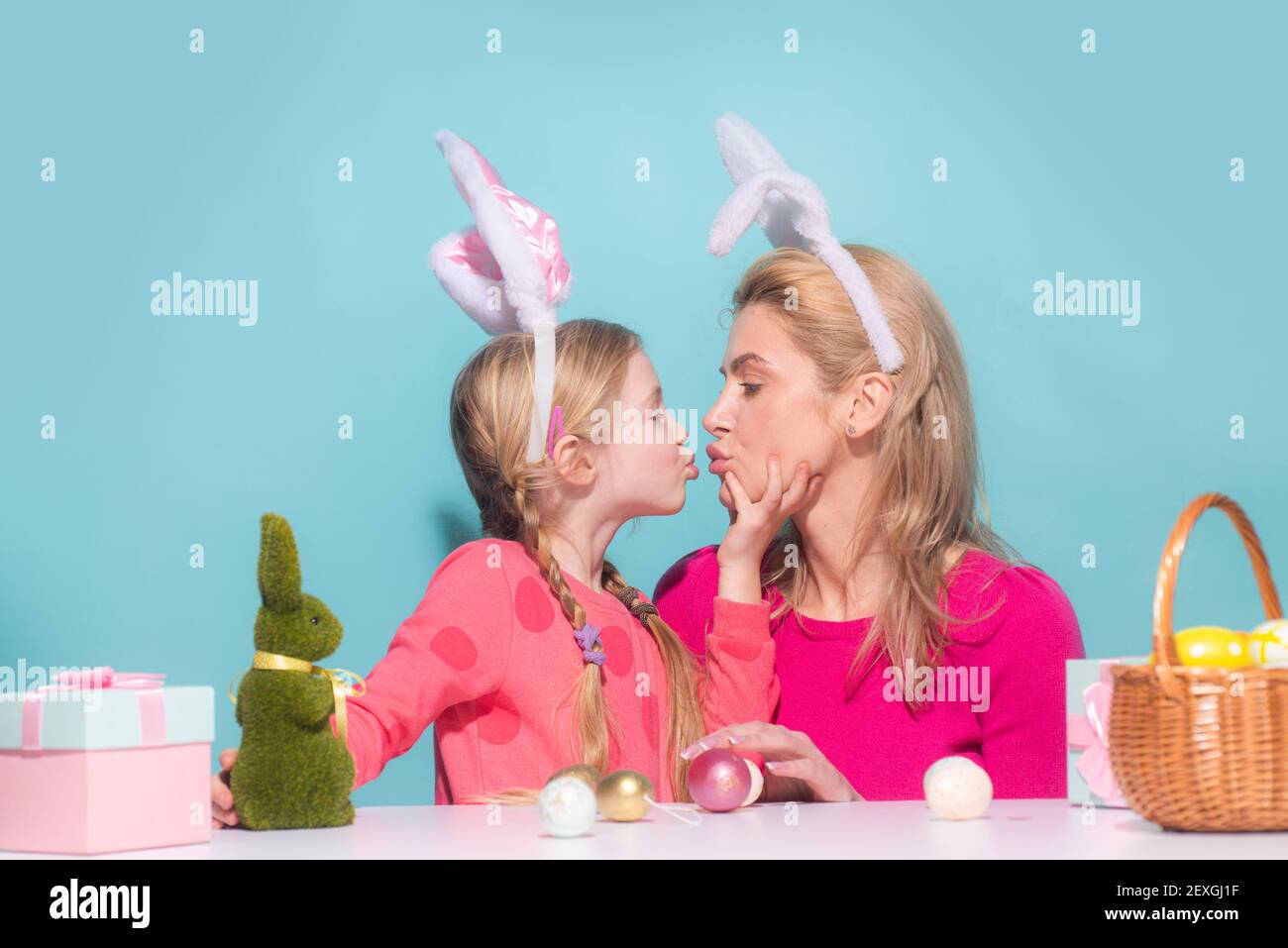 Mother and child daughter on Easter. Family celebrate Easter. Girls ...